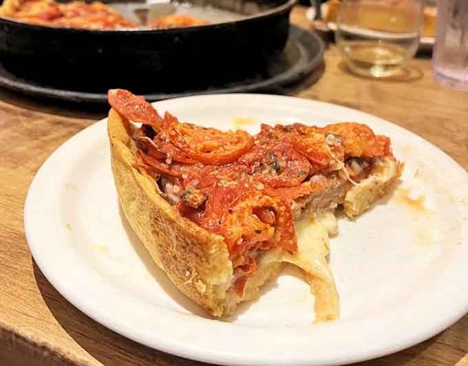 This slice stands taller than most people's ambitions and tastes infinitely better than broken dreams.