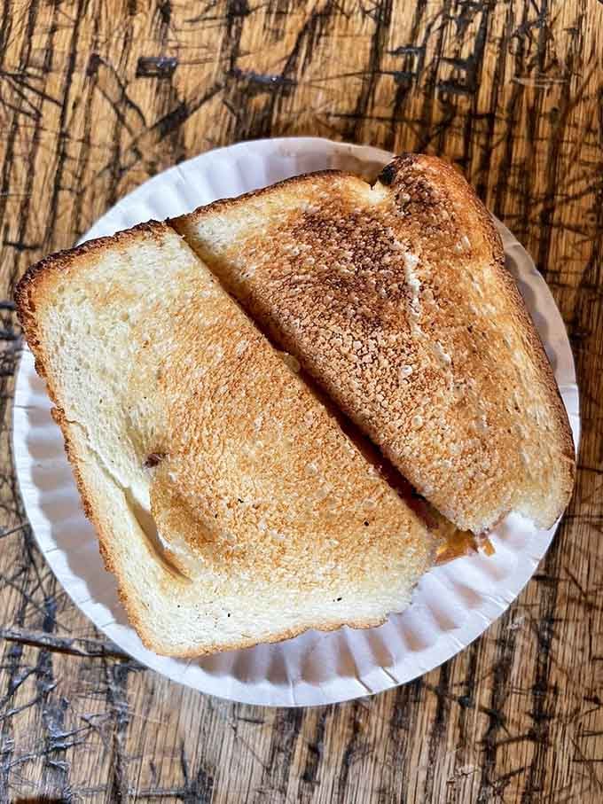 The toast gets gloriously crispy from the burger's heat, creating a texture that makes modern buns seem flimsy.