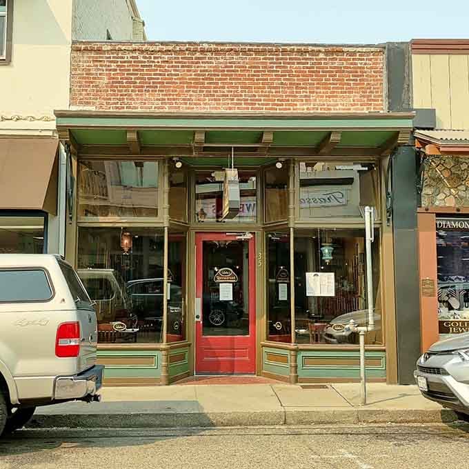 Behind that classic storefront with its welcoming red door lies the kind of authentic small-town shopping experience that big city malls try desperately to manufacture.