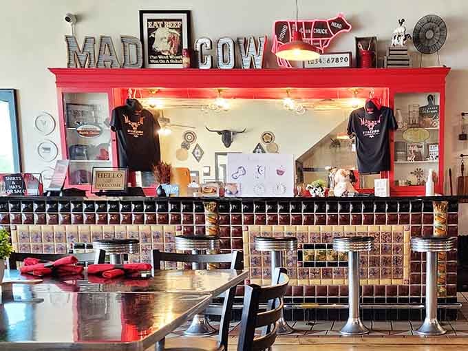 Mad Cow Steakhouse serves up nostalgia alongside its meals with classic diner counter seating and decor that celebrates local heritage.
