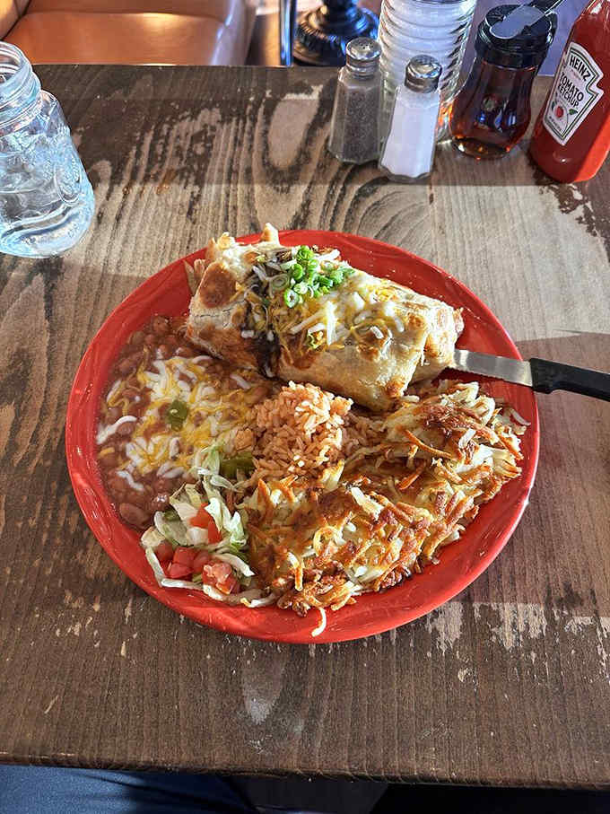 A breakfast burrito situation that requires both hands and possibly a forklift to navigate successfully through your meal.