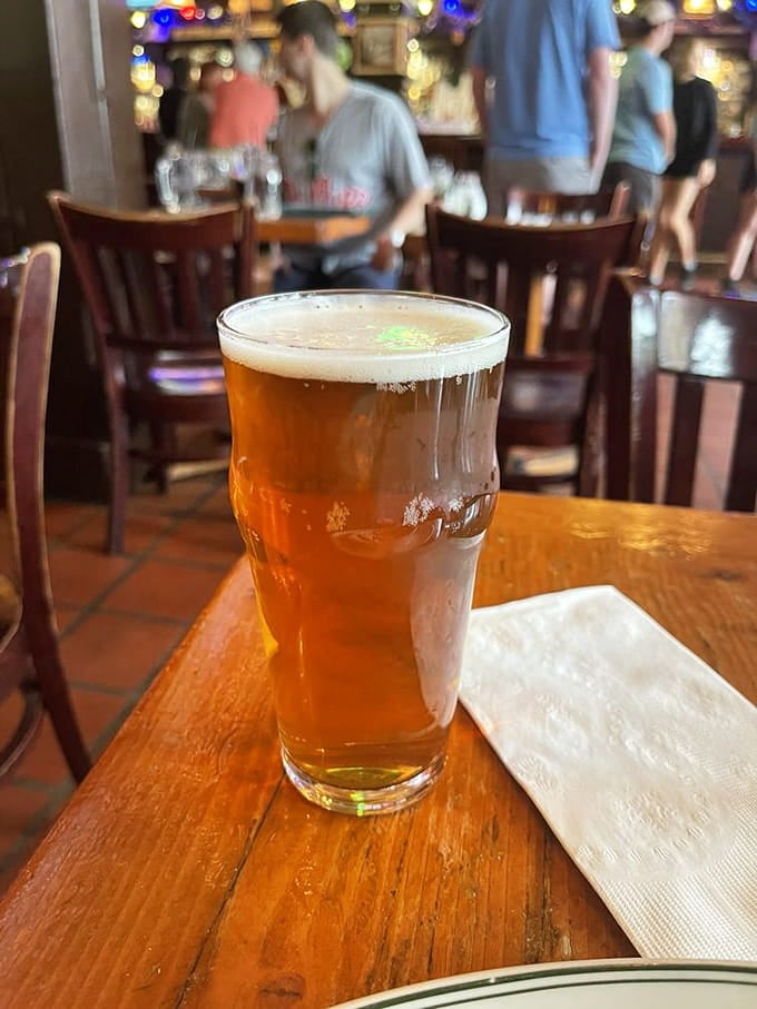 A perfectly poured pint catching the light—this is what beer looks like when it's served by people who actually care.