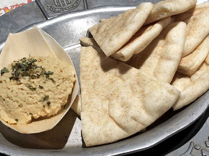 Hummus and pita making a surprise appearance, because apparently the Middle Ages had excellent Mediterranean connections.