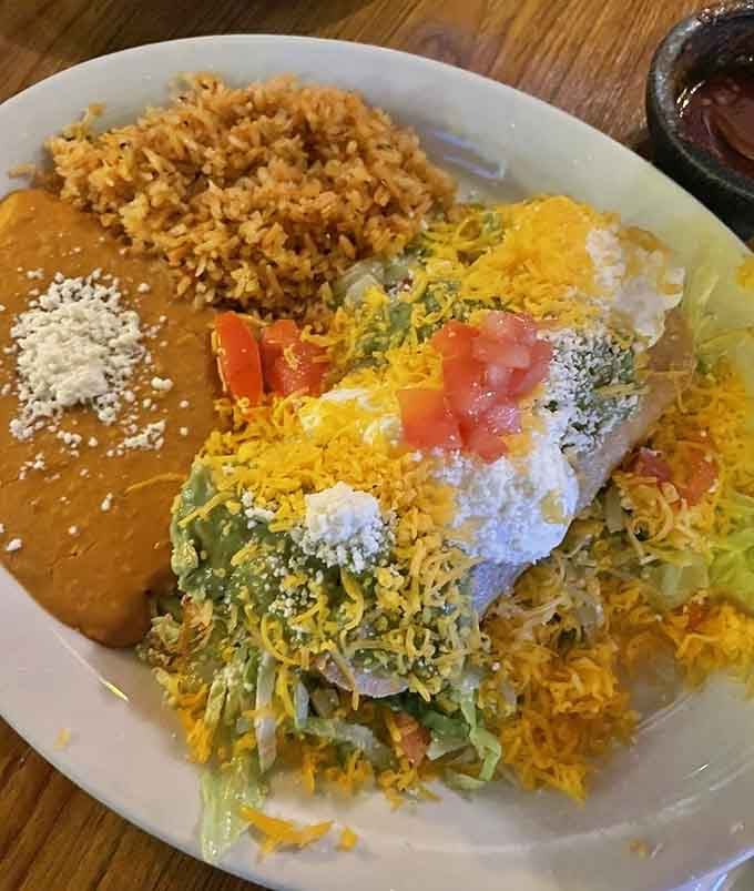 Crispy flautas with perfectly seasoned rice and creamy beans, the supporting cast that could easily steal the show.