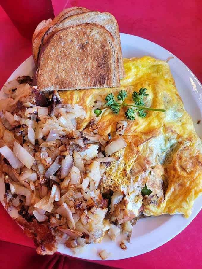 Hash browns meet eggs and vegetables in a harmony that would make your grandmother proud and full.