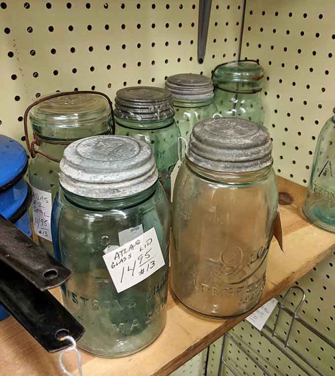 Atlas mason jars lined up like soldiers of preservation, ready to store everything from buttons to memories.