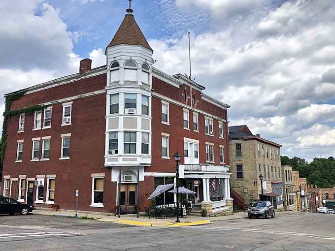 Those vintage street lamps and historic storefronts create an atmosphere that makes you want to slow down and actually look around.