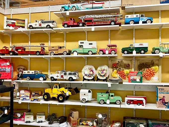 Toy trucks that survived decades of imaginary construction projects now park patiently on display shelves, waiting for collectors rather than sandbox adventures.