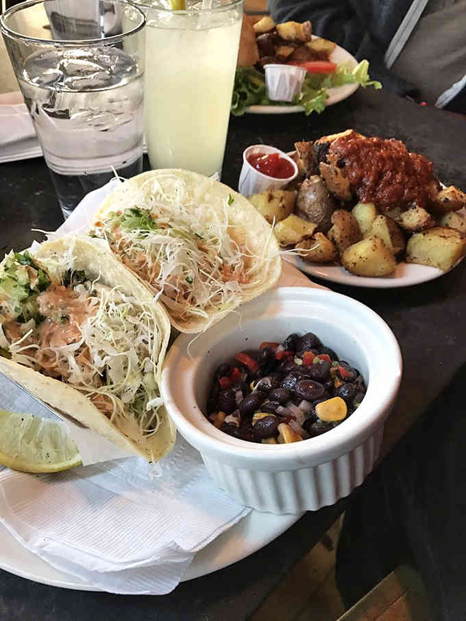 Fresh fish tacos with all the toppings show that not everything here needs a science degree to understand.