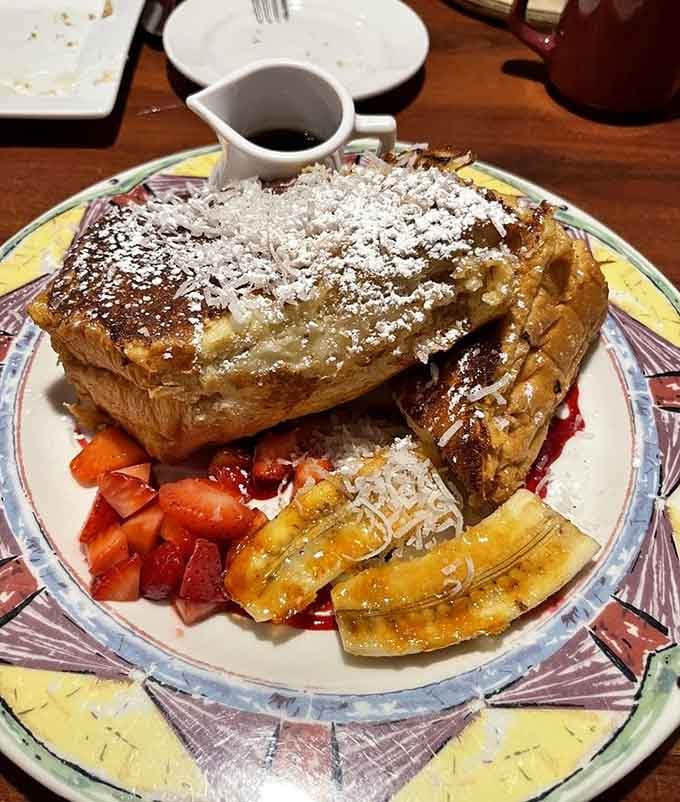 Coconut cream French toast dusted with powdered sugar like fresh snow on the most delicious mountain you've ever seen.