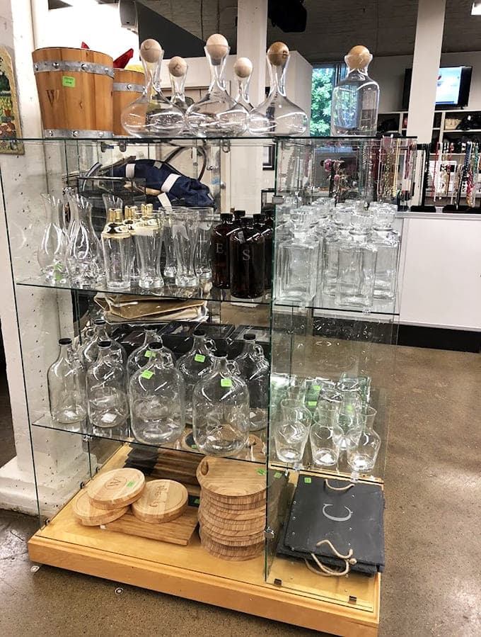 Glassware gleams on display shelves, offering everything from everyday tumblers to fancy decanters for special occasions.
