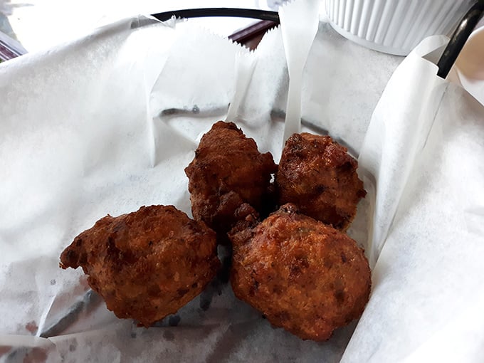 Golden, crispy conch fritters that prove the best things in life come in perfectly fried, bite-sized packages.