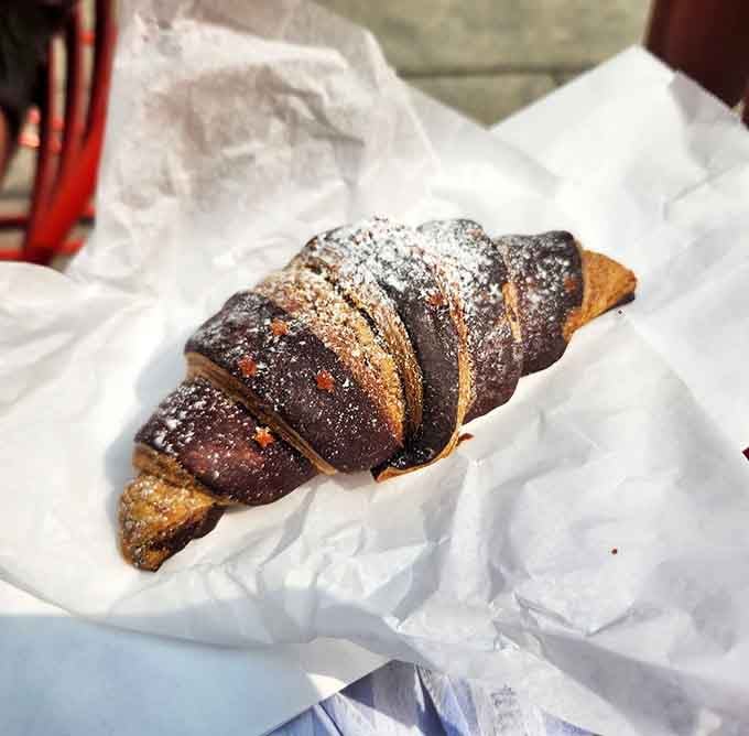 Chocolate croissant with that perfect flaky exterior, because sometimes the French and Italians agree on delicious things.