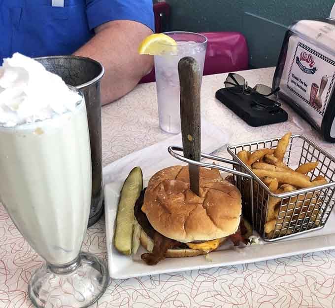 The metal shake cup means there's always more waiting, like finding extra fries at the bottom of the bag.