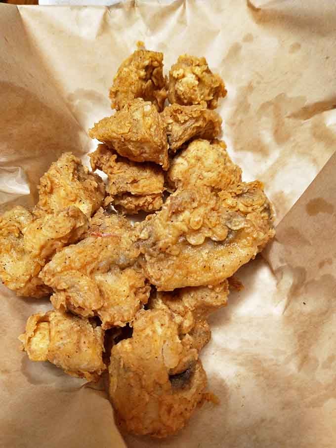 Golden-fried perfection that shatters with each bite. These crispy morsels aren't just food&mdash;they're edible treasure wrapped in paper.