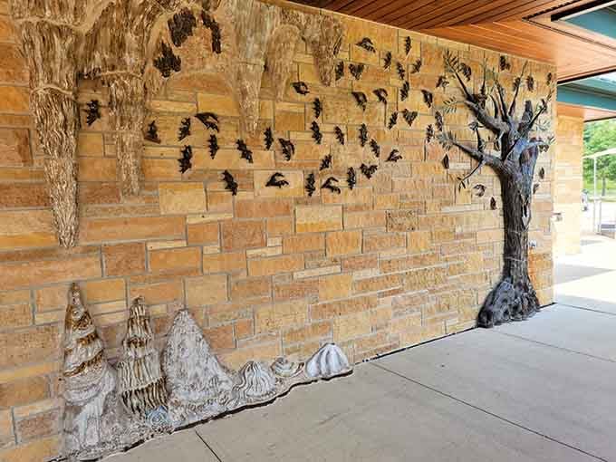 Bats in flight decorate the visitor center, celebrating the cave's most famous seasonal residents and conservation heroes.