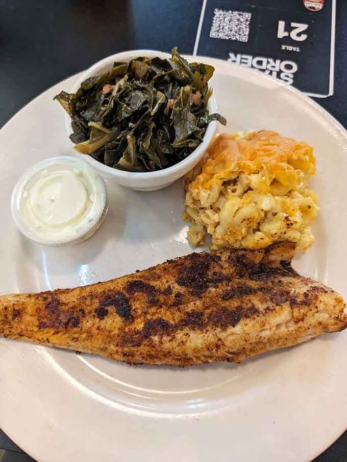 Perfectly seasoned blackened fish with collards and mac and cheese proves healthy can be hearty too.