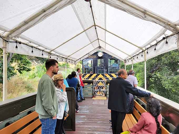 The covered platform fills with anticipation as passengers await their journey through time and spectacular California landscape.