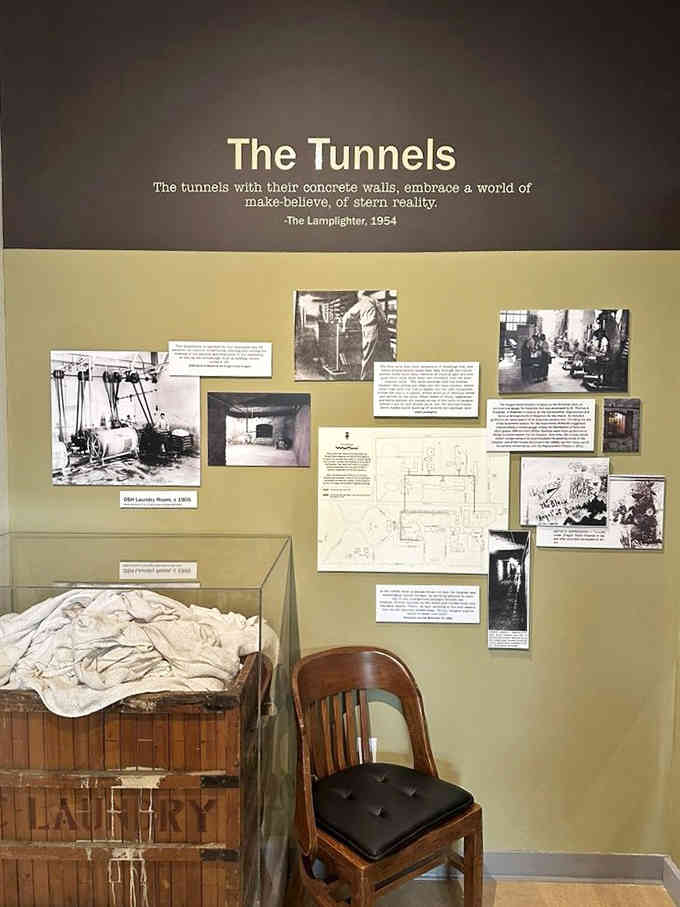 The tunnel exhibit reveals the hidden infrastructure that connected buildings, a world beneath the world patients knew above.