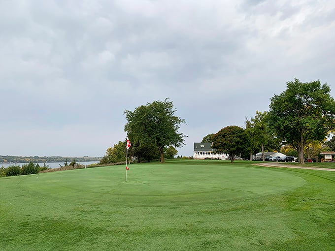 Green fairways roll toward the lake, offering golfers views that might distract from their putting game.