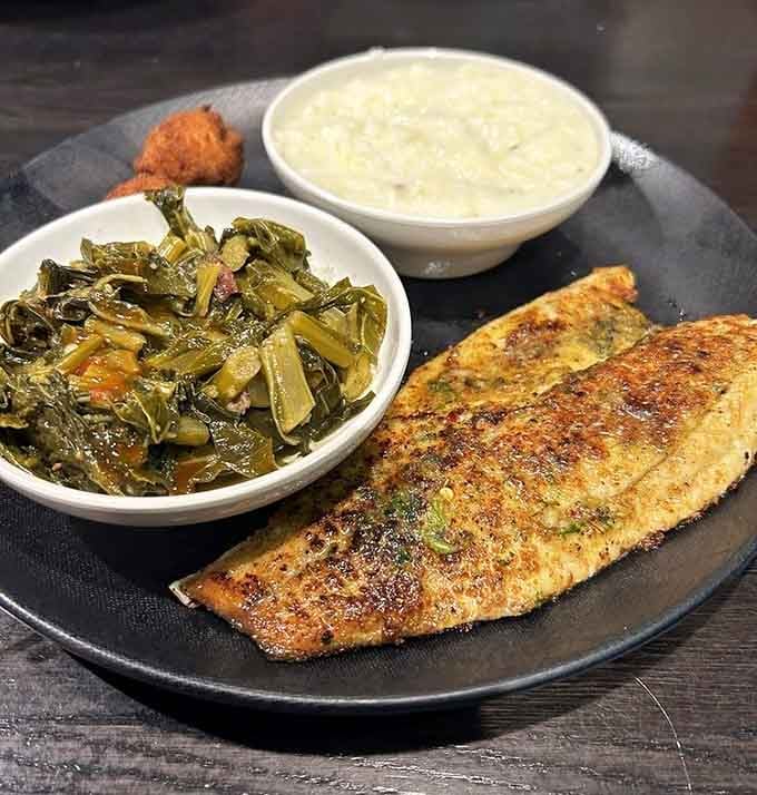 Blackened sea bass with collard greens proves that Southern cooking knows exactly how to treat fresh seafood right.