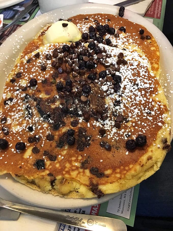 Pancakes that don't just sit on the plate&mdash;they command attention with blueberries and chocolate chips playing supporting roles in this breakfast blockbuster.