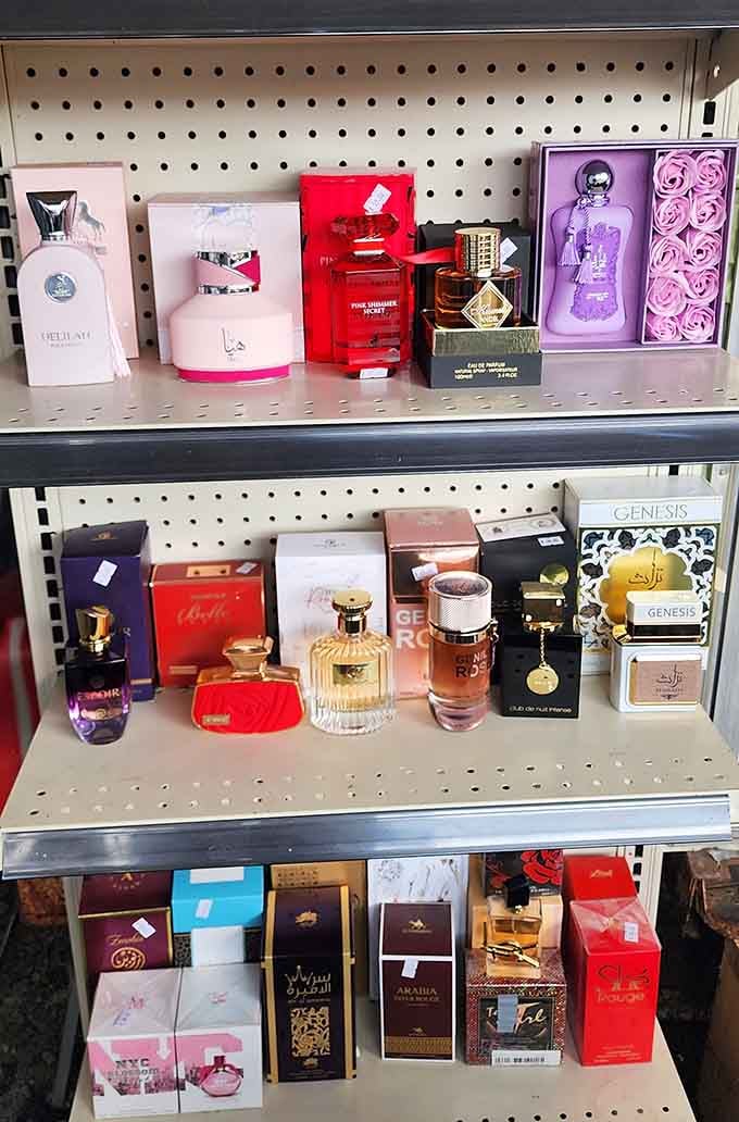 Perfume bottles standing at attention like fragrant soldiers ready to make you smell like a million bucks for twenty.