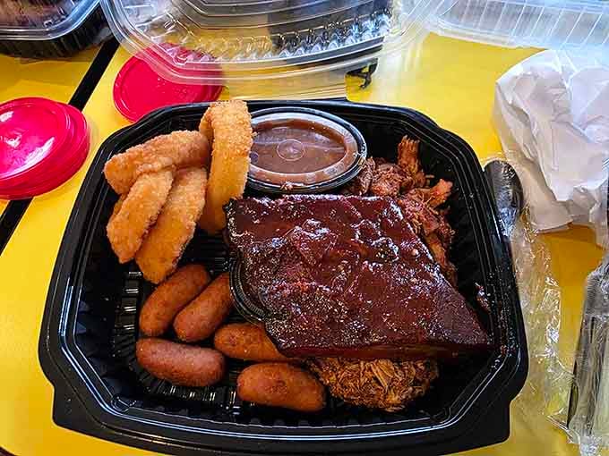 Ribs, chicken tenders, onion rings, and hushpuppies create a feast that proves variety is indeed the spice of barbecue life.