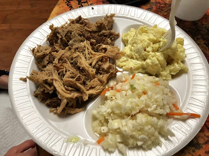 Pulled pork plate with all the fixings &ndash; proof that patience and smoke can transform the ordinary into the extraordinary. Simple food executed with extraordinary care.