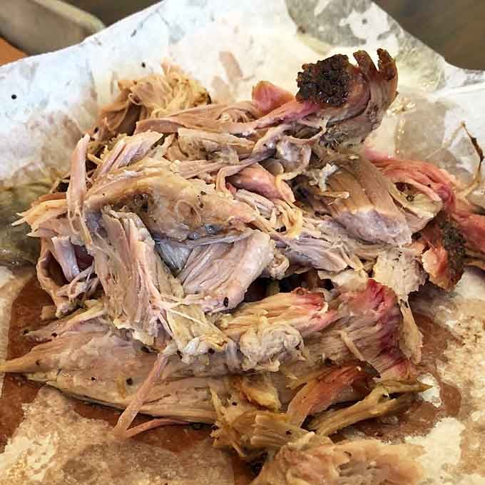 Pulled pork that surrenders at the slightest touch&mdash;tender strands of smoky goodness that have clearly made peace with their delicious destiny.