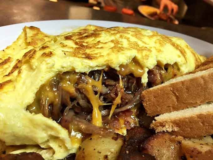 That pulled pork omelet is basically a barbecue party wrapped in eggs, and everyone's invited to this delicious celebration.
