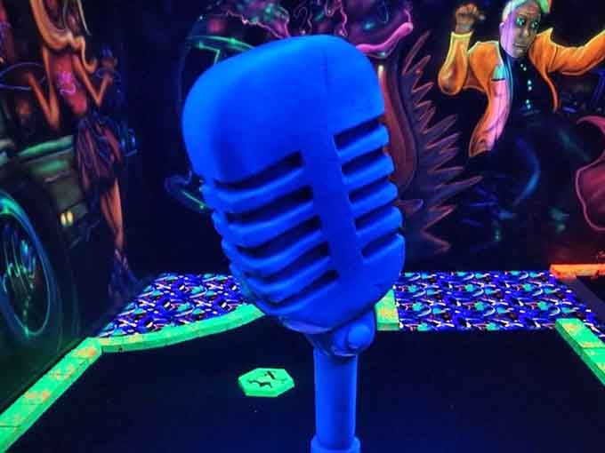 This vintage microphone glows blue like it's ready to belt out one more power ballad for the ages.