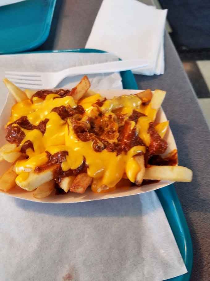 Chili cheese fries that require a fork, a napkin, and possibly a moment of silent gratitude before diving in headfirst.