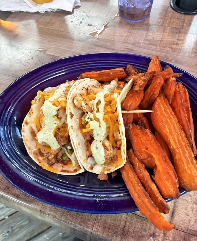 Shrimp tacos with sweet potato fries prove that fusion done right makes everyone happy at the table.
