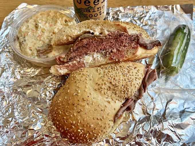 The Roast Beef Blues on a bulkie roll, accompanied by coleslaw and a pickle spear for good measure.