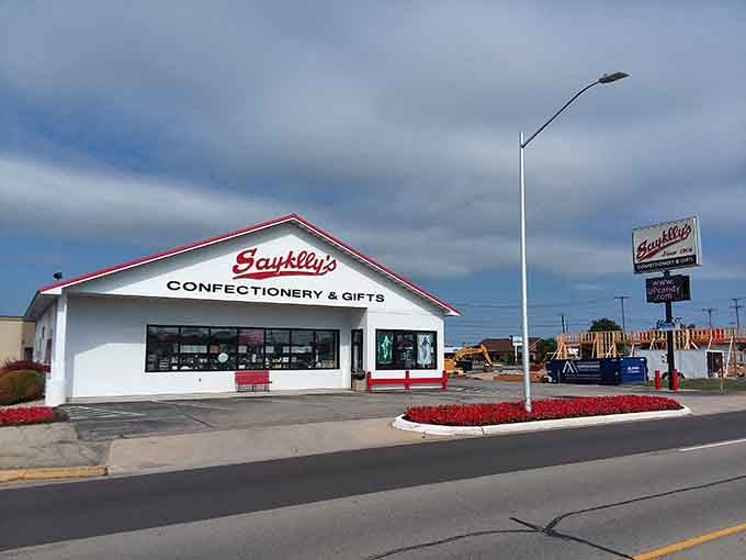 Sayklly's Confectionery beckons with sweet promises, a temple of temptation where diets go to die and chocolate-covered memories are born.