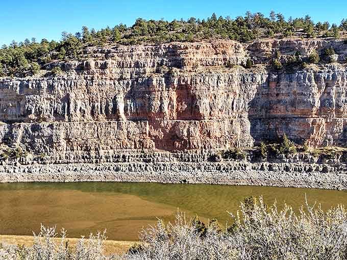 Layer cake geology that would make Paul Hollywood jealous. These sedimentary cliffs reveal Earth's recipe book spanning millions of years.