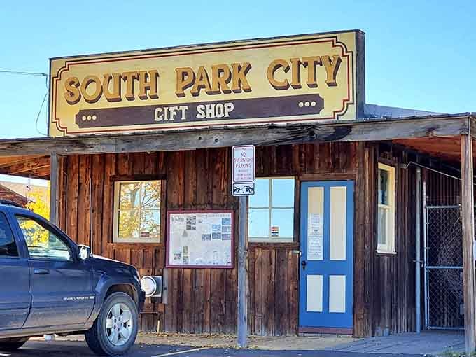 The gift shop entrance welcomes you with weathered wood that's seen more Colorado seasons than we can count.