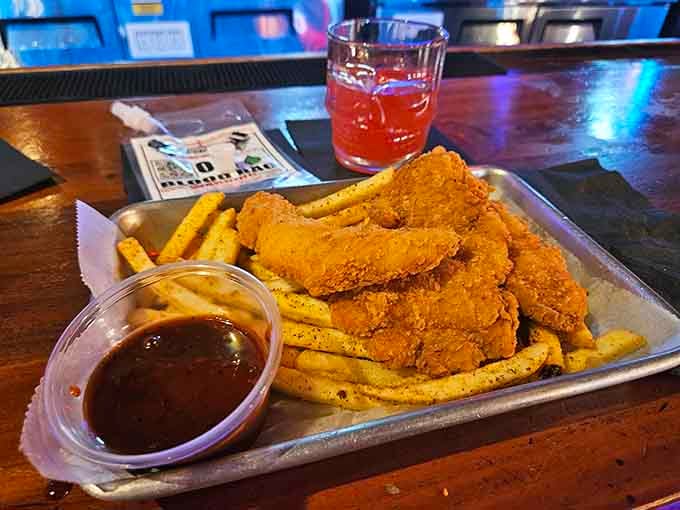 Crispy battered fish meets golden fries in this classic combo that tastes as good as it looks.