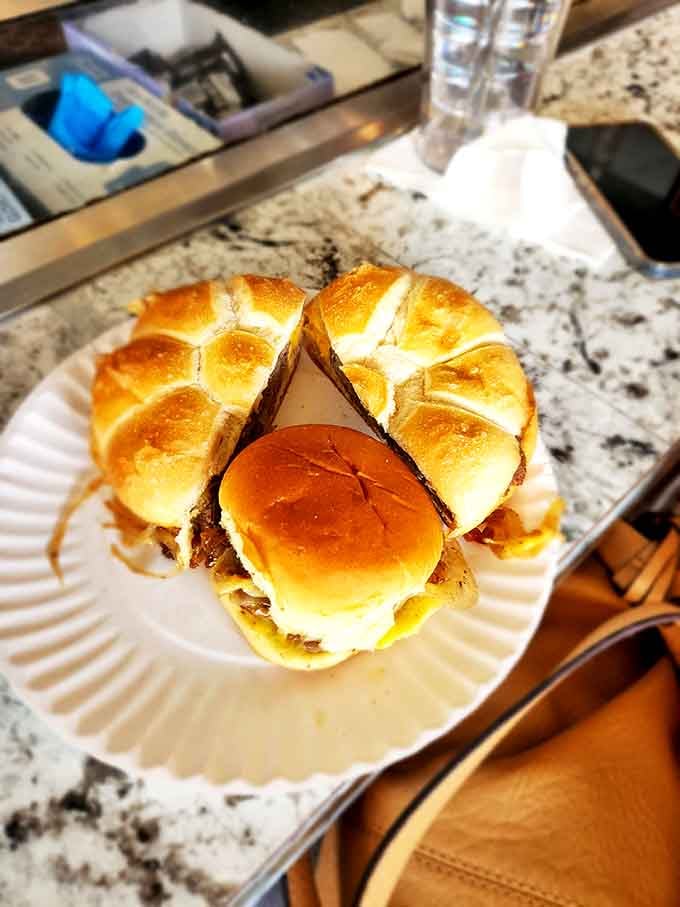 The quartet of sliders arranged like a culinary compass, pointing the way to flavor town. No passport required.