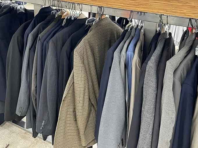 Suits hanging like they're waiting for their next big meeting, proving professional attire doesn't require professional-level spending.