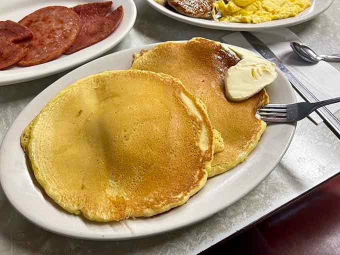 Pancakes so perfectly golden and fluffy, they make IHOP nervous about their life choices and career trajectory.