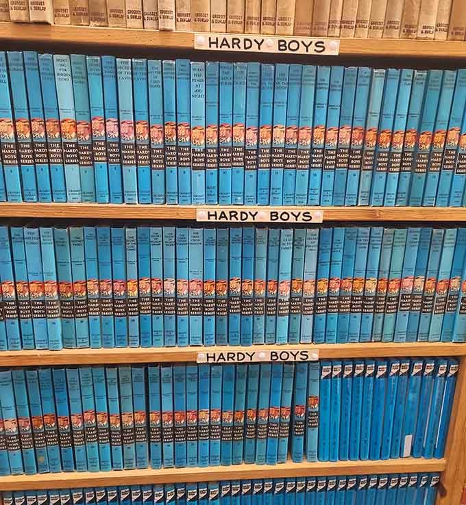 The complete Hardy Boys collection in those iconic blue spines, a nostalgic treasure trove for mystery lovers.