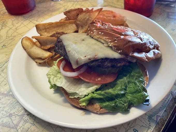 This American Cheese Burger stacked high with all the fixings makes choosing between cheese varieties your toughest in-flight decision.