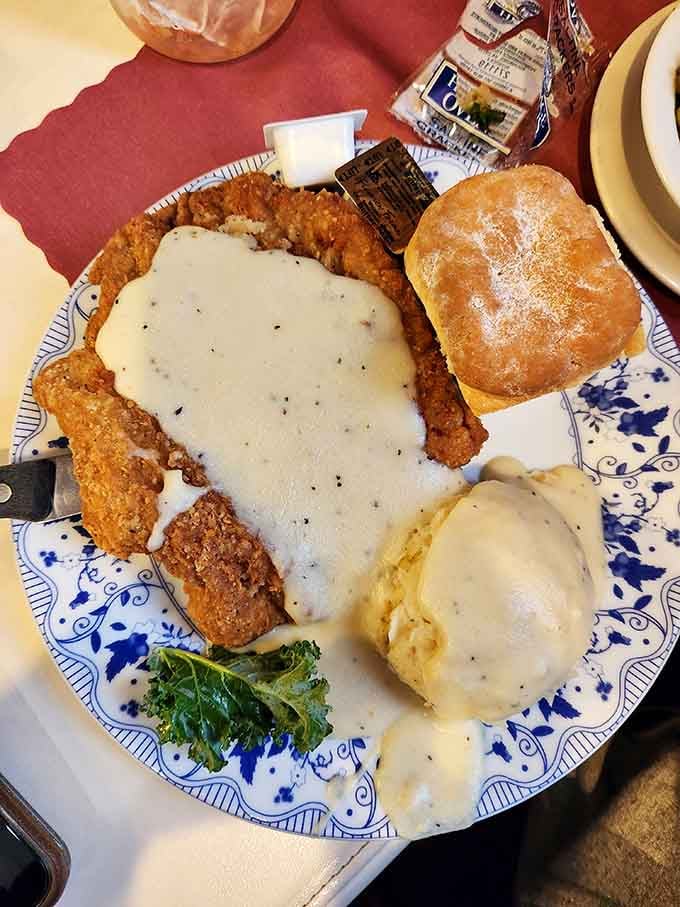 Country fried steak smothered in gravy with all the fixings, because subtlety is overrated at breakfast time.