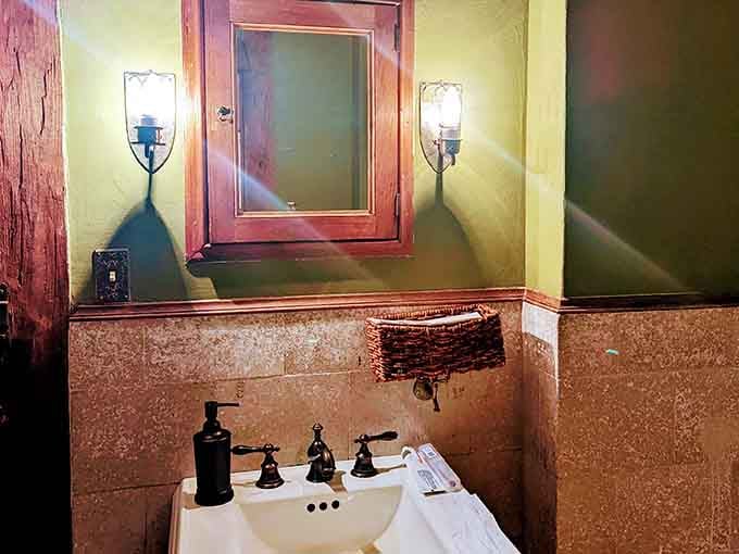 Even the restroom maintains the castle aesthetic because commitment to theme matters, people.