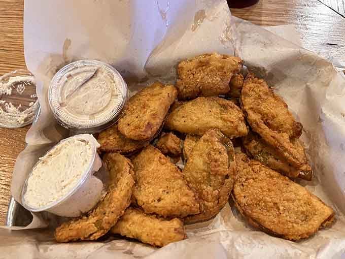 Fried green tomatoes achieving that perfect golden crust, crispy outside and tangy inside, just like your grandmother would approve.