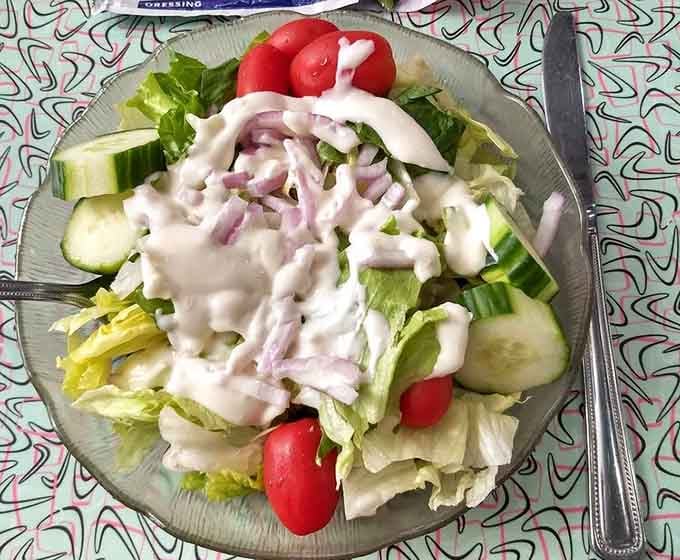Fresh salad with creamy dressing proves diners know their way around vegetables too, surprisingly enough.
