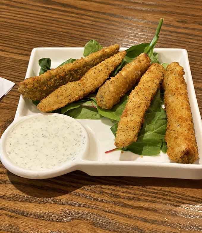 Breaded pickle spears that crunch like autumn leaves and taste like your new favorite guilty pleasure snack.