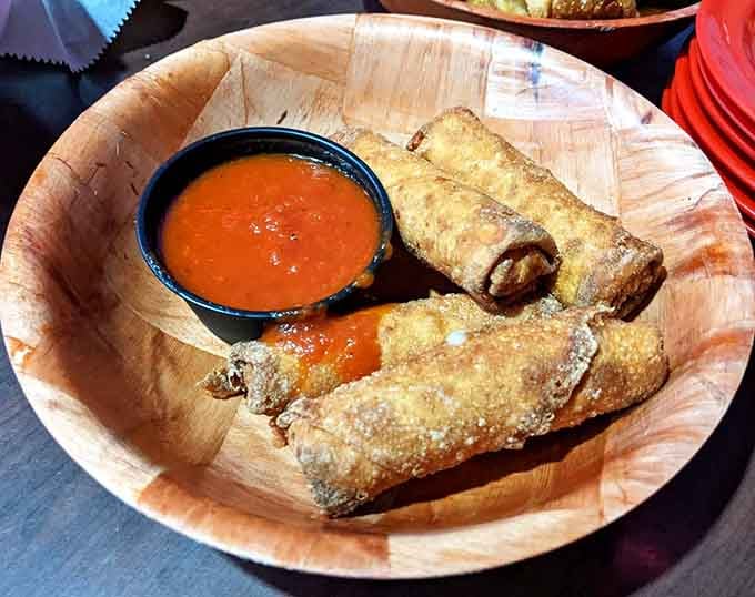 Crispy spring rolls offer a brief detour from burger territory, though nobody's judging if you skip them.